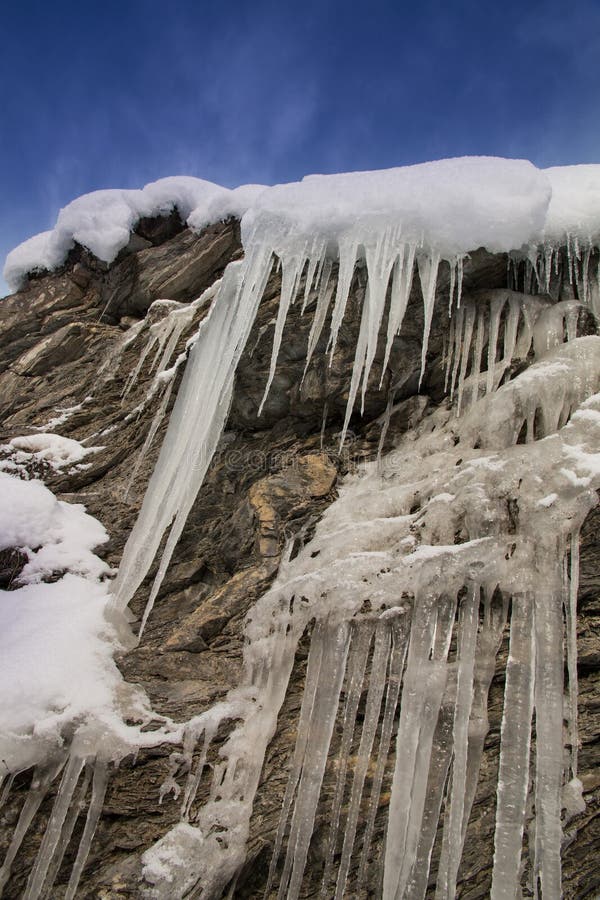 Ice Stalactites Under Blue Sky Stock Photo - Image of frosty ...