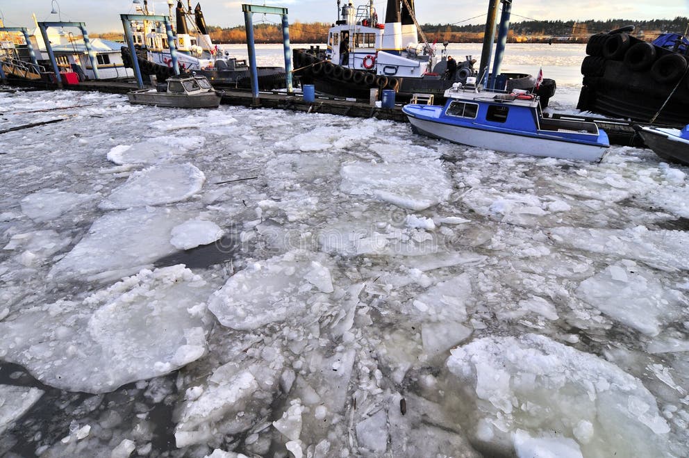 Ice surrounding the pier stock image. Image of flowing - 28475131