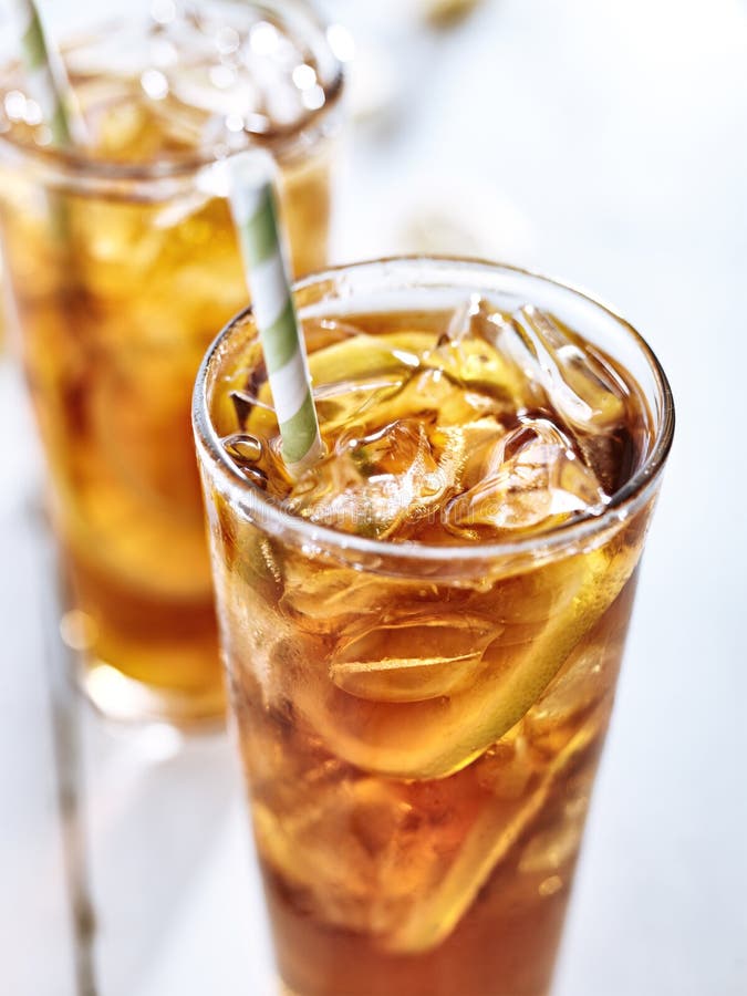 Ice tea with straw closeup stock image. Image of close - 33367049