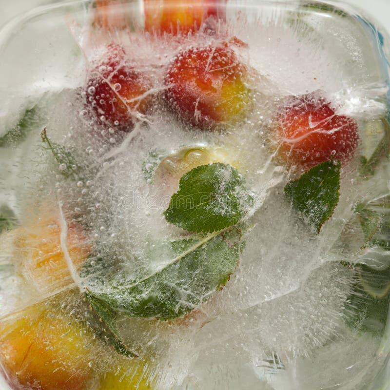 Ice Texture with Small Round Plums Inside Stock Photo - Image of ...