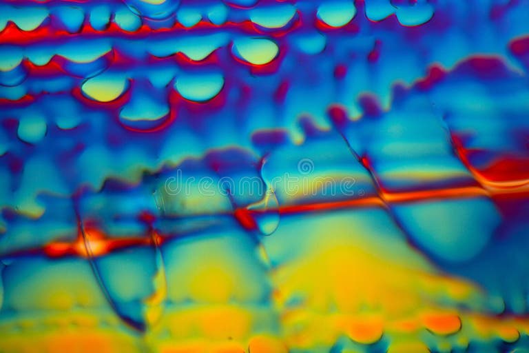 Ice under the microscope stock image. Image of rainbow - 70518589