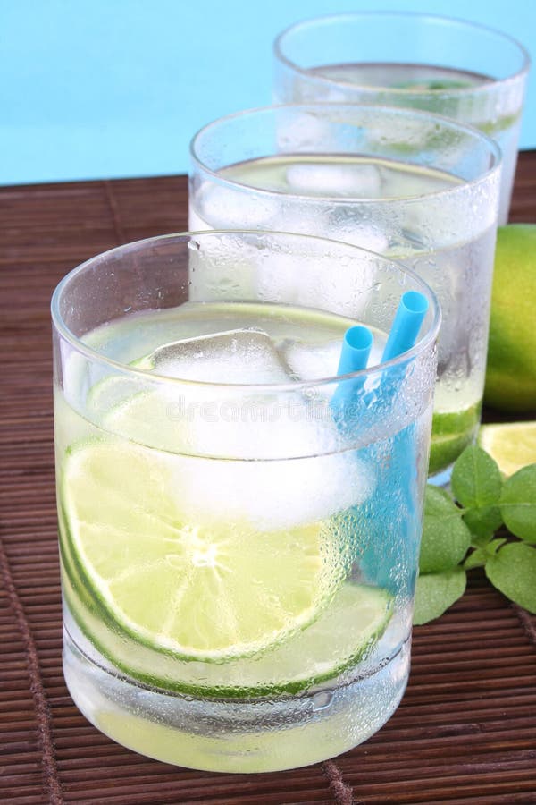 Ice water with lime stock photo. Image of flavoured, flavored - 5148814
