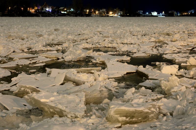 Ice on the water at night stock photo. Image of travel - 134830960