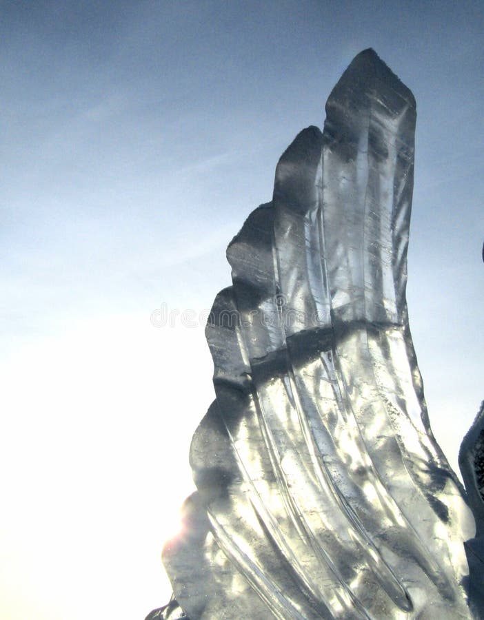 Ice Wing on Sky Background and Sun Rays Stock Photo - Image of textured ...