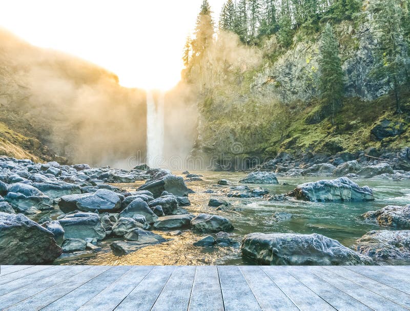 Ice Wooden Table with Background of Scenic View of Water Fall when ...