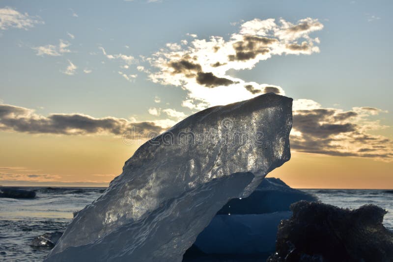 Iceberg on Diamond Beach Sunset Stock Photo - Image of sunset ...