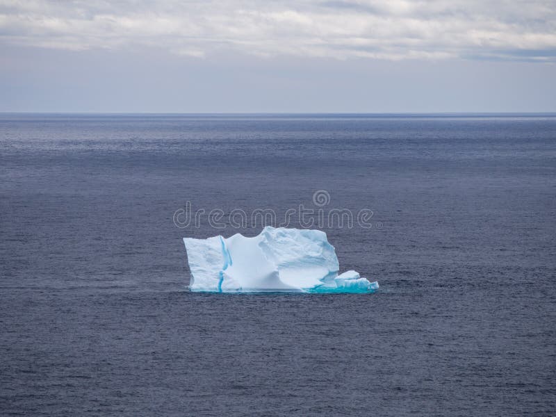 Iceberg on open ocean stock image. Image of cold, ocean - 124957161