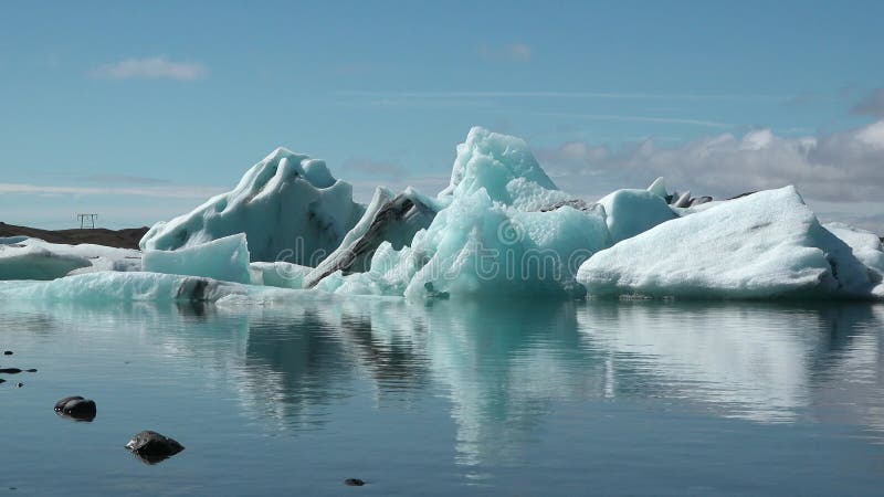 Icebergs and Global Warming. Icebergs are Melting in the Turquoise Bay ... Icebergs and Global Warming. Icebergs are Melting in the Turquoise Bay ...