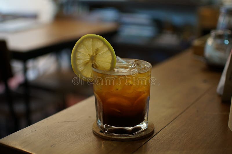 Iced Americano with lemon stock photo. Image of coffee - 91911536