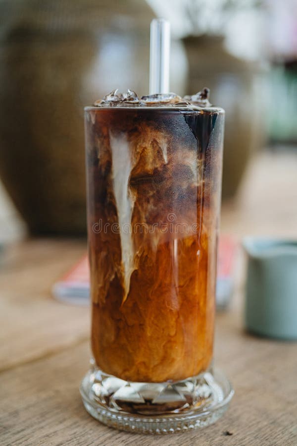 Iced Americano with Milk on the Table Stock Photo - Image of cafe ...