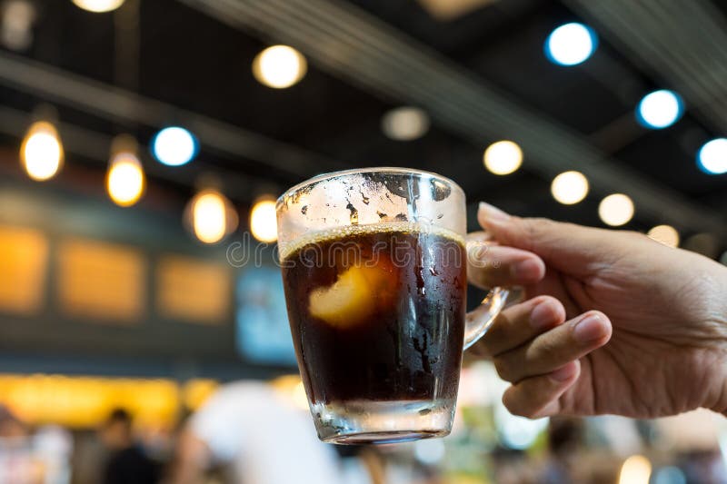 Glass of Refreshing Drink with Strawberry on Sandy Beach, Space for ...