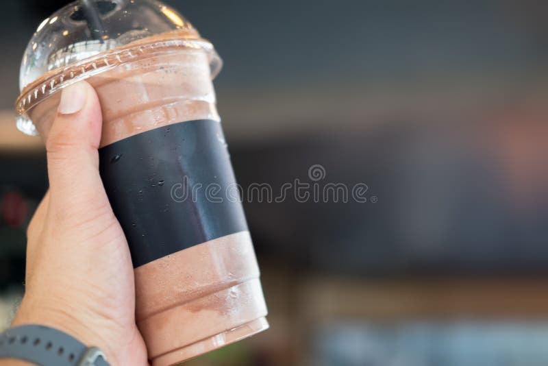 Iced cocoa in takeaway cup stock photo. Image of beverage - 130550096