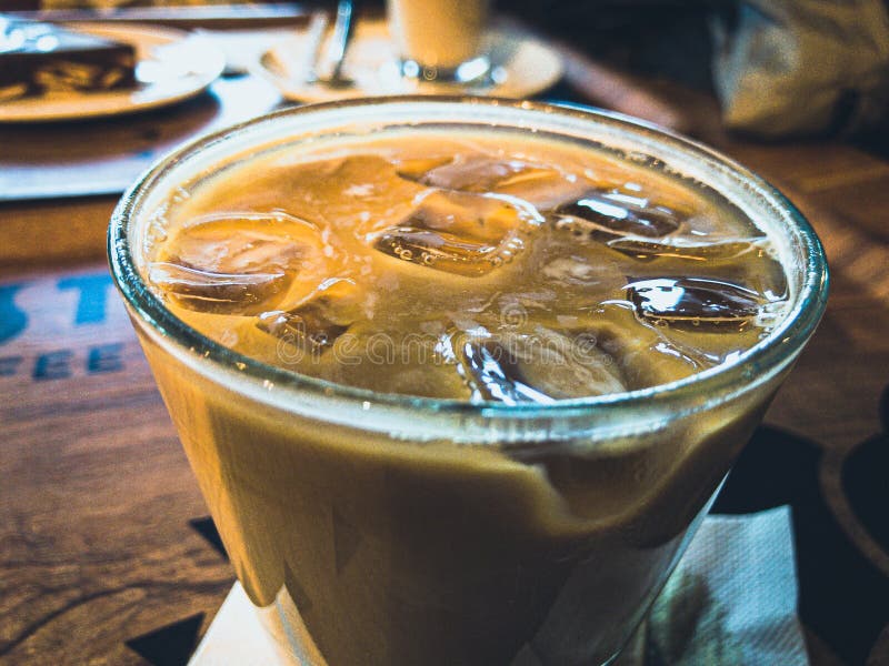 Iced coffee in a glass. stock photo. Image of liqueur - 256462484