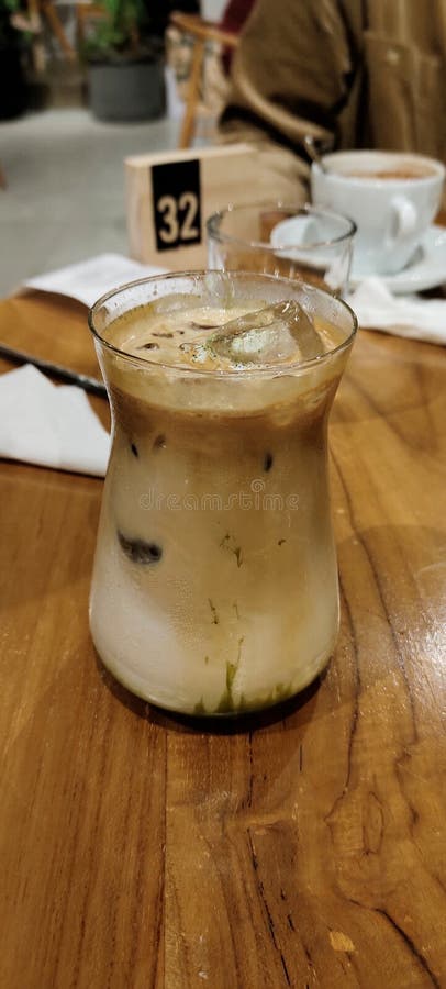 Iced Coffee Latte in a Tall Glass Stock Photo - Image of latte, tall ...