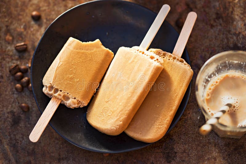 Iced coffee lollies stock image. Image of brown, cool - 93122055
