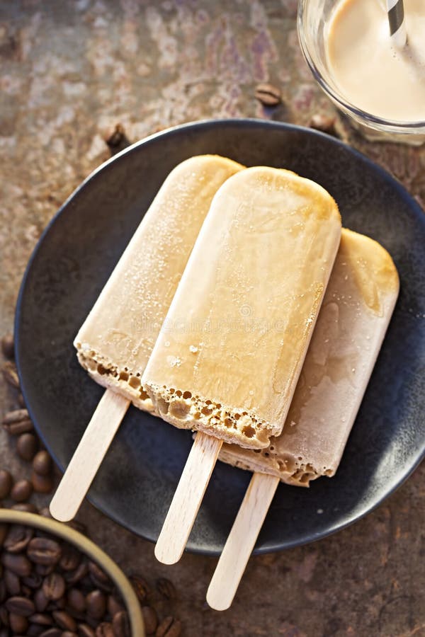 Iced coffee lollies stock image. Image of brown, cool - 93122055
