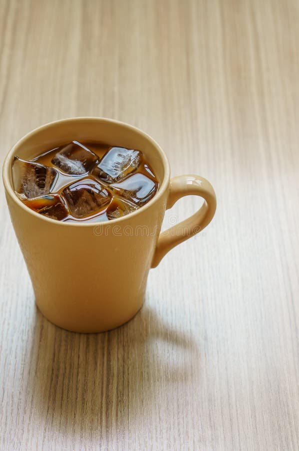 Iced Coffee in Mug on Wooden Stock Image - Image of decor, caffeine ...