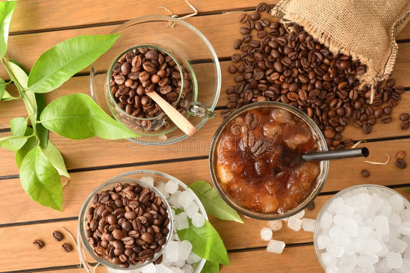 Iced Coffee on Wooden Table in Nature Elevated View Stock Photo - Image ...