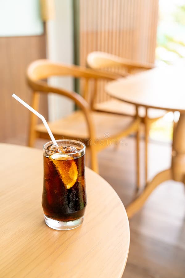 Iced cola glass with ice stock photo. Image of brown - 266453992