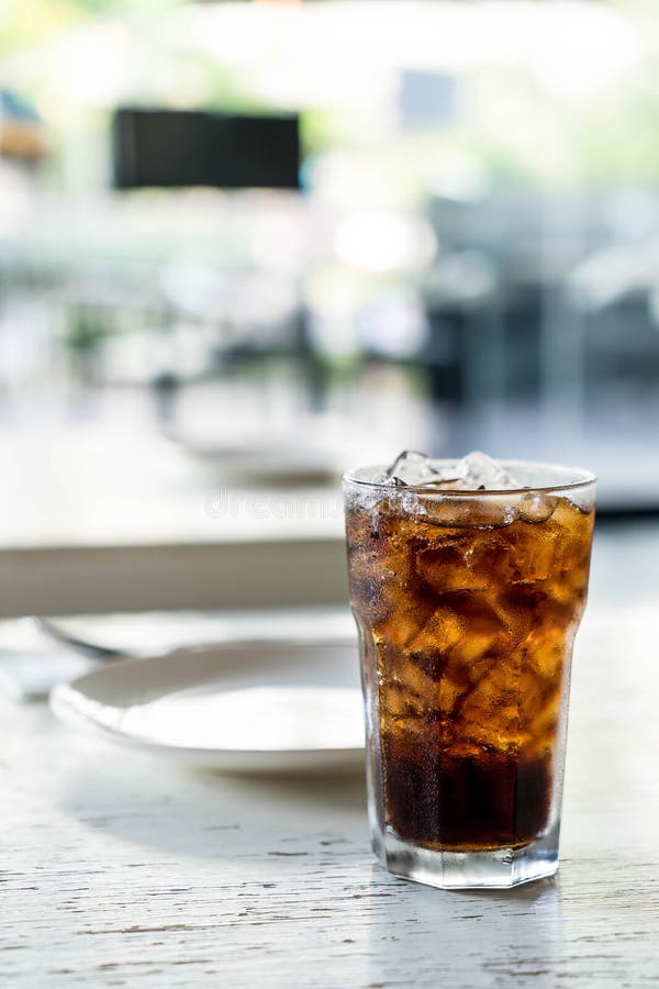Iced cola on the table stock photo. Image of liquid, white - 93677000