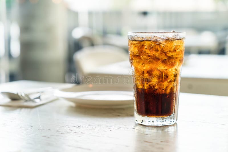 Iced cola on the table stock image. Image of caffeine - 94007463