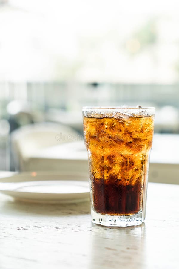 Iced cola on the table stock photo. Image of cocktail - 94962820