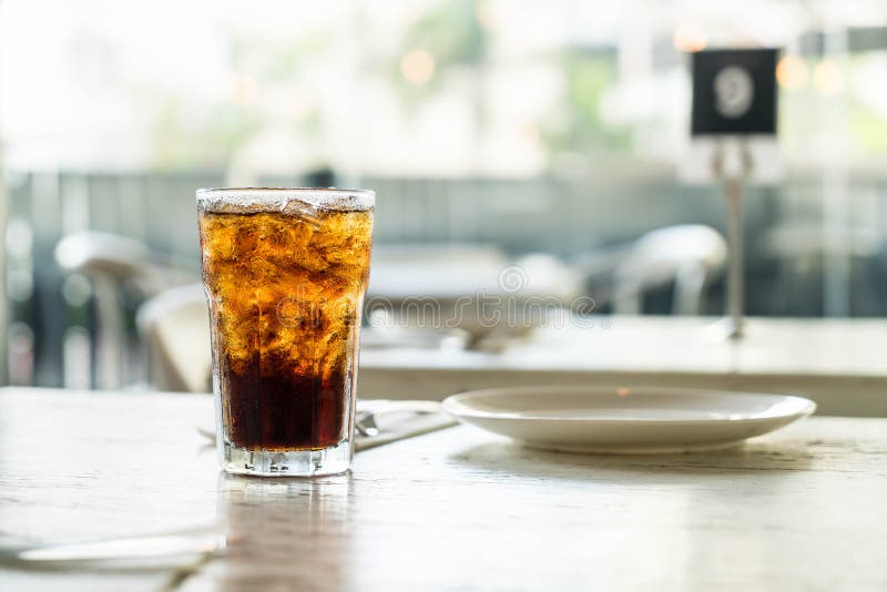 Iced cola on the table stock image. Image of table, refreshment - 97265231