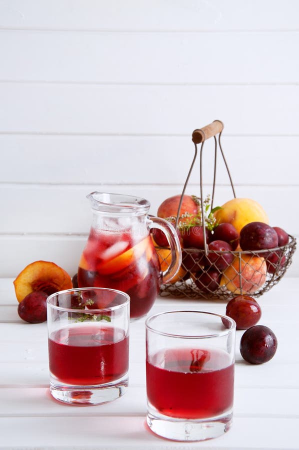 Iced Fruit Compote with Peaches and Plums. Cold Summer Drink. Stock ...