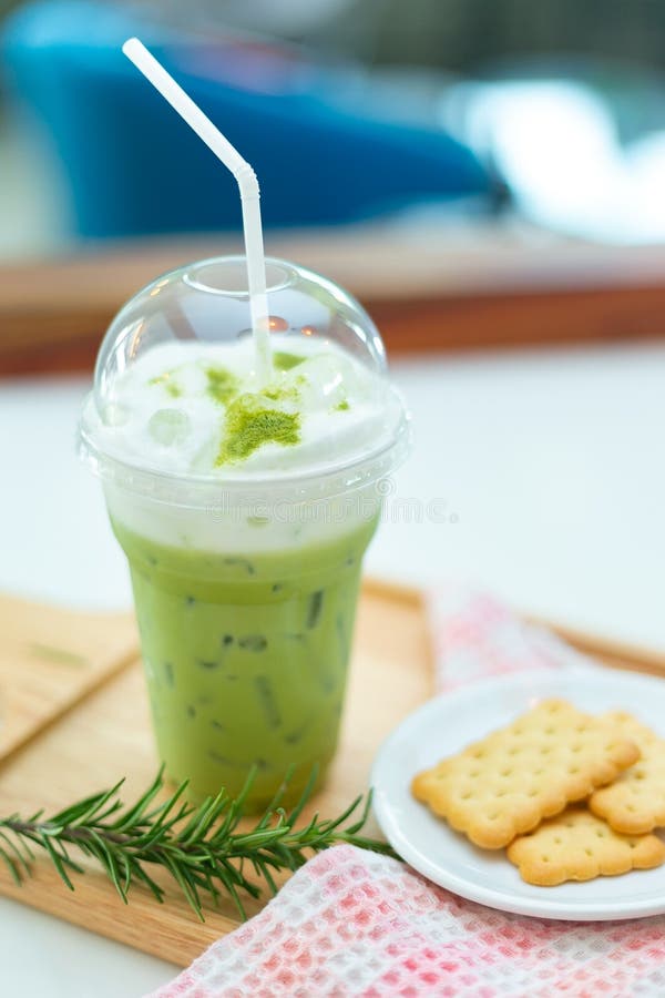 Iced Green Tea with Cracker on Wooden Plate Stock Image - Image of milk ...