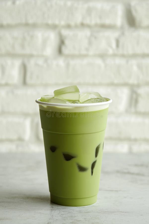 Iced Green Tea in Paper Cup with Ice Cubes, Minimalistic Background ...