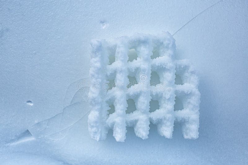 Iced Grid on a Ice Surface with Cracks. Abstract Stock Photo - Image of ...