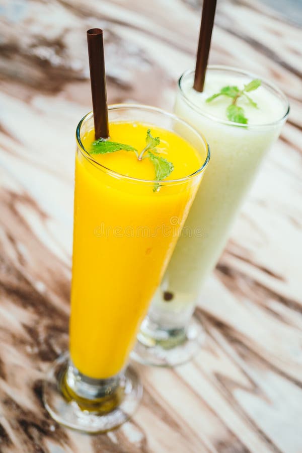 Iced Mango smoothie glass stock image. Image of breakfast - 240938787
