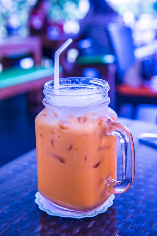 Iced Milk Tea with Modern Vase on the Table Stock Image - Image of ...