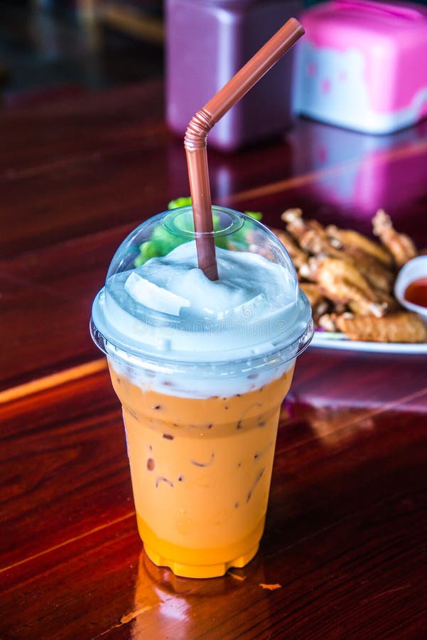 Iced Milk Tea in Plastic Cup Stock Photo - Image of mixed, appetizing ...