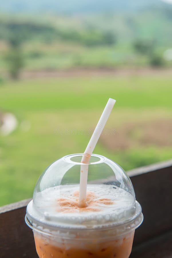 Iced Milk Tea in Plastic Glass with Natural View Stock Image - Image of ...