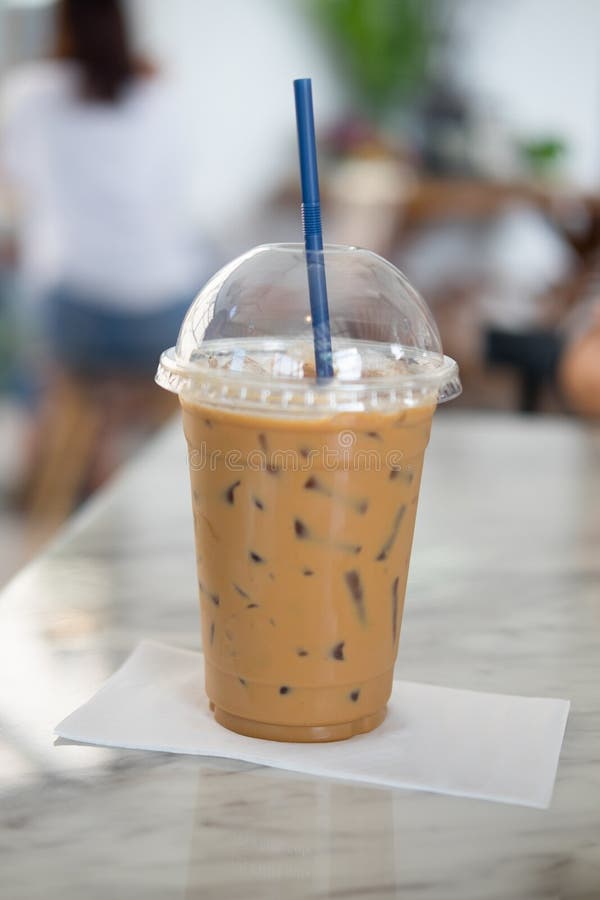 Iced mocha with blue straw stock image. Image of iced - 131762735