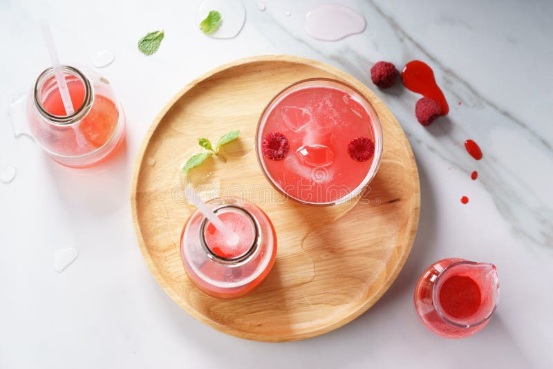 Iced red raspberry drinks stock image. Image of fruit - 77031361