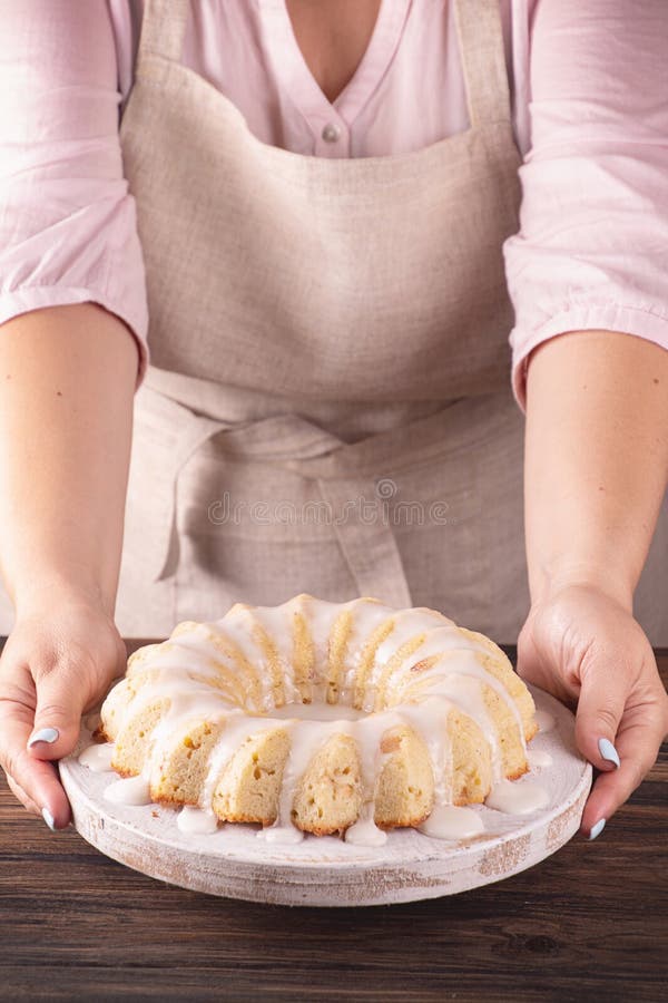 Iced Sugar Cake on Tray in Woman Hands Stock Image - Image of woman ...