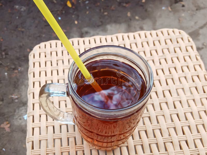 Iced Tea in a Glass Cup on a Plastic Chair Stock Photo - Image of ...