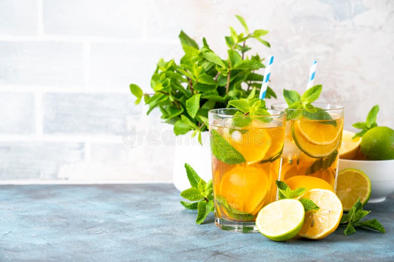 Iced Tea with Lemon, Lime, Mint and Ice. Stock Photo - Image of water ...