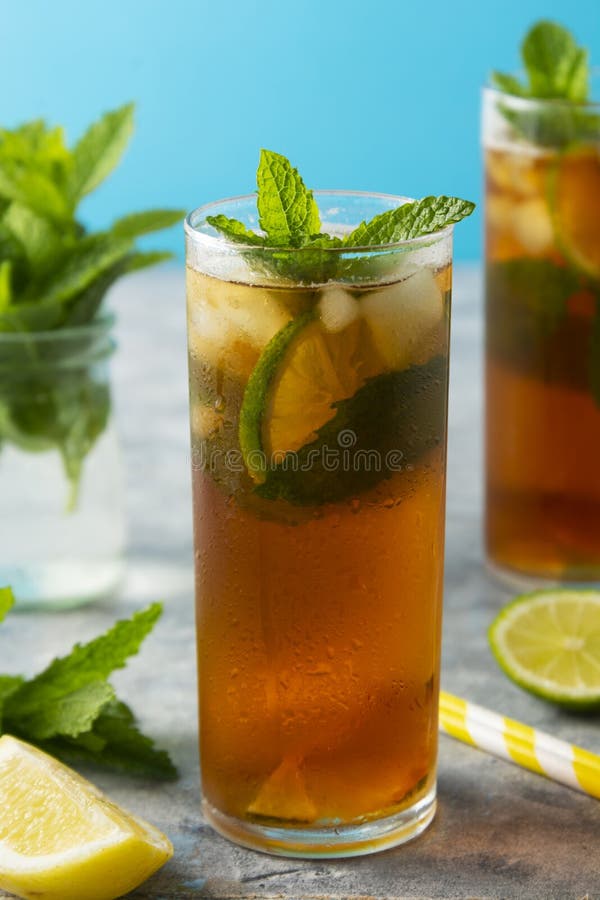 Iced Tea with Lemon, Lime Summer Cold Fruit Drink with Mint Leaves ...