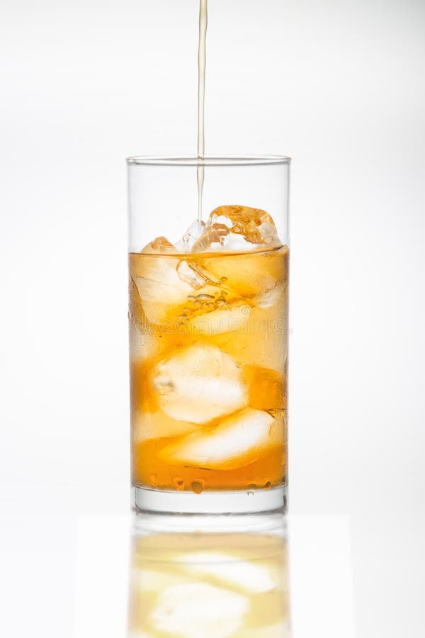 Iced Tea Pouring into a Glass of Ice Stock Image - Image of drinking ...