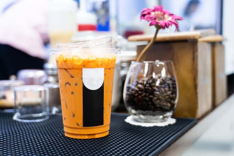 Iced Thai Milk Tea, Thai Style Cold Drink in a Plastic Cup. on the ...