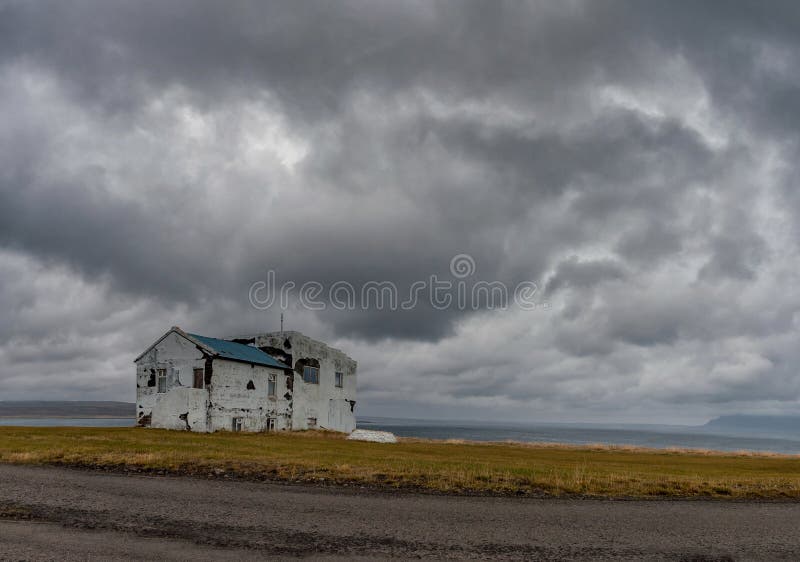 Iceland Landscape with Lonely Building. Cloudy Blue Sky Stock Photo ...