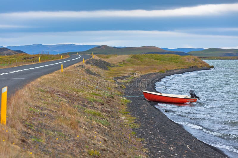 Iceland Landscape with a Red Boat Stock Image - Image of color, pond ...