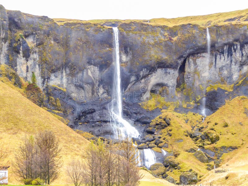 Iceland - Tall Waterfall in the Mountains Stock Photo - Image of island ...