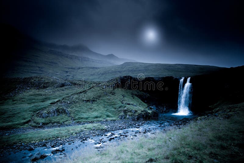Iceland Waterfall at Night with Moon Stock Photo - Image of stream ...