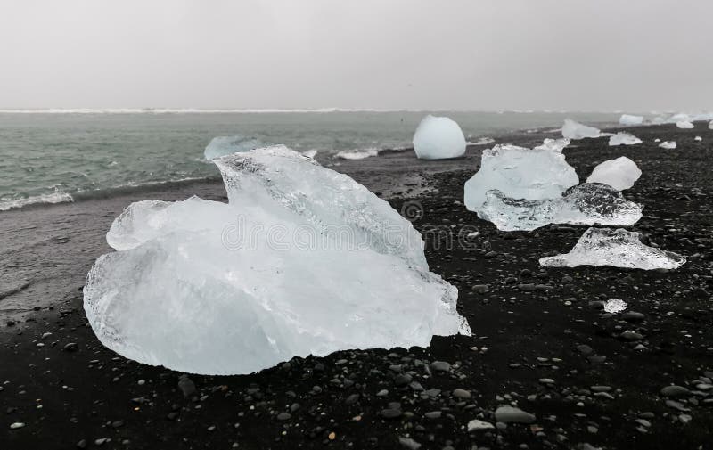 Ices in Jokulsarlon Beach, Iceland Stock Image - Image of iceland, blue ...