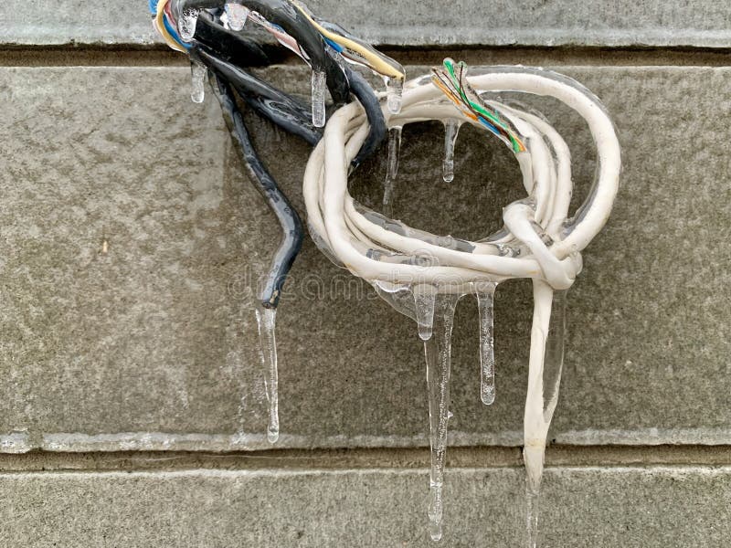 Icicle on Electrical Wiring. Ice Icicles on the Righteous. Concept ...