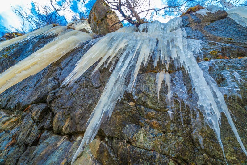 Icy cliff stock image. Image of melt, snow, storm, winter - 516263